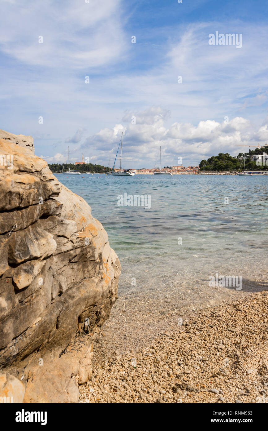 Gravel beach with rocks on the croatian Coast, clear water Stock Photo ...