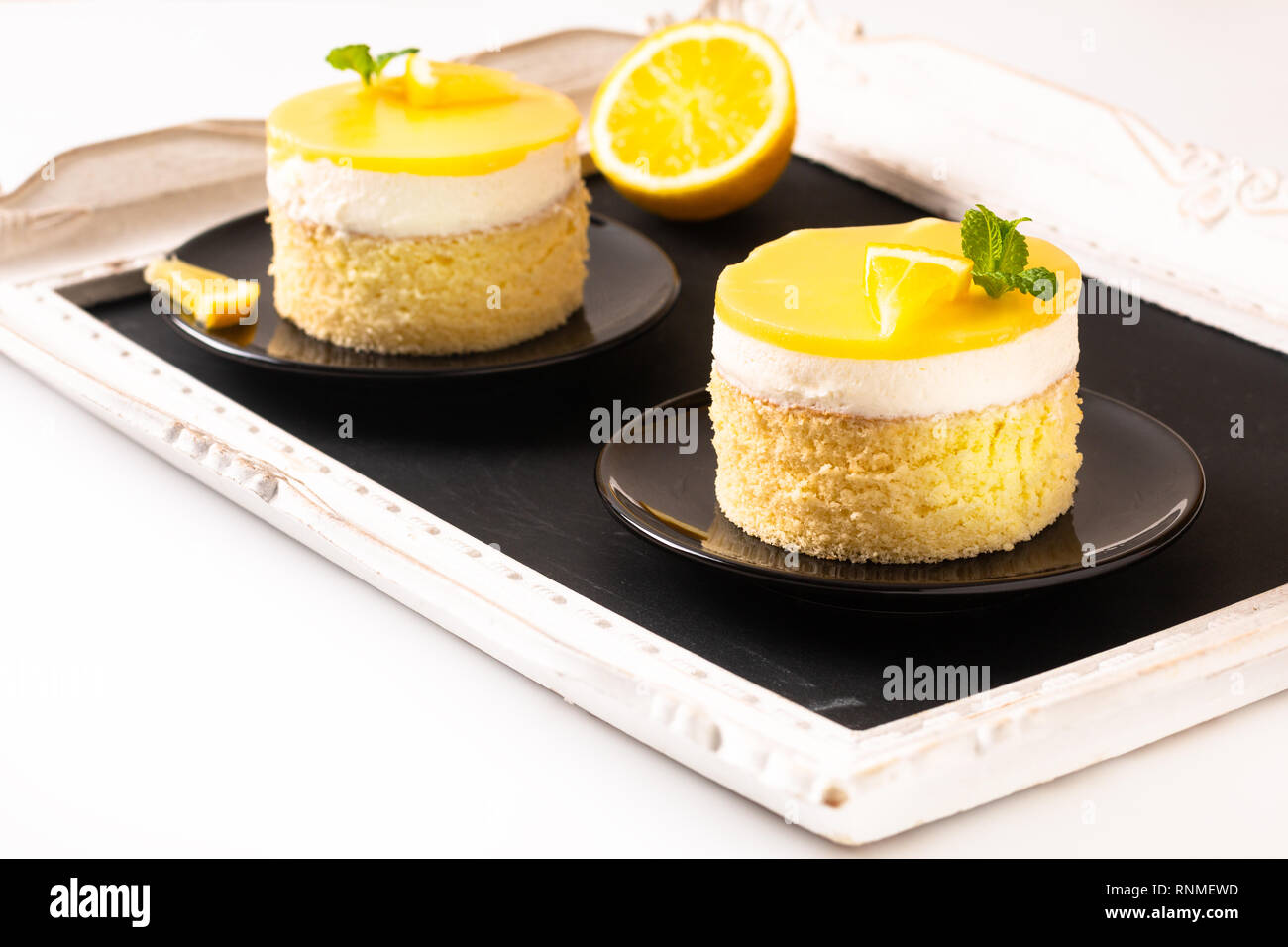 Food concept Homemade Lemon curd sponge cake with fresh whipped cream ...