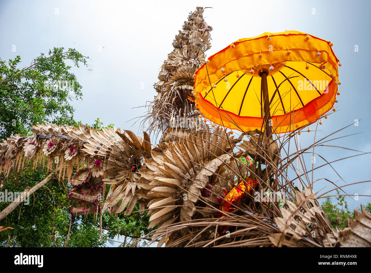 Decorative Penjor or Penyor poles and Tedung umbrella for Galungan ...