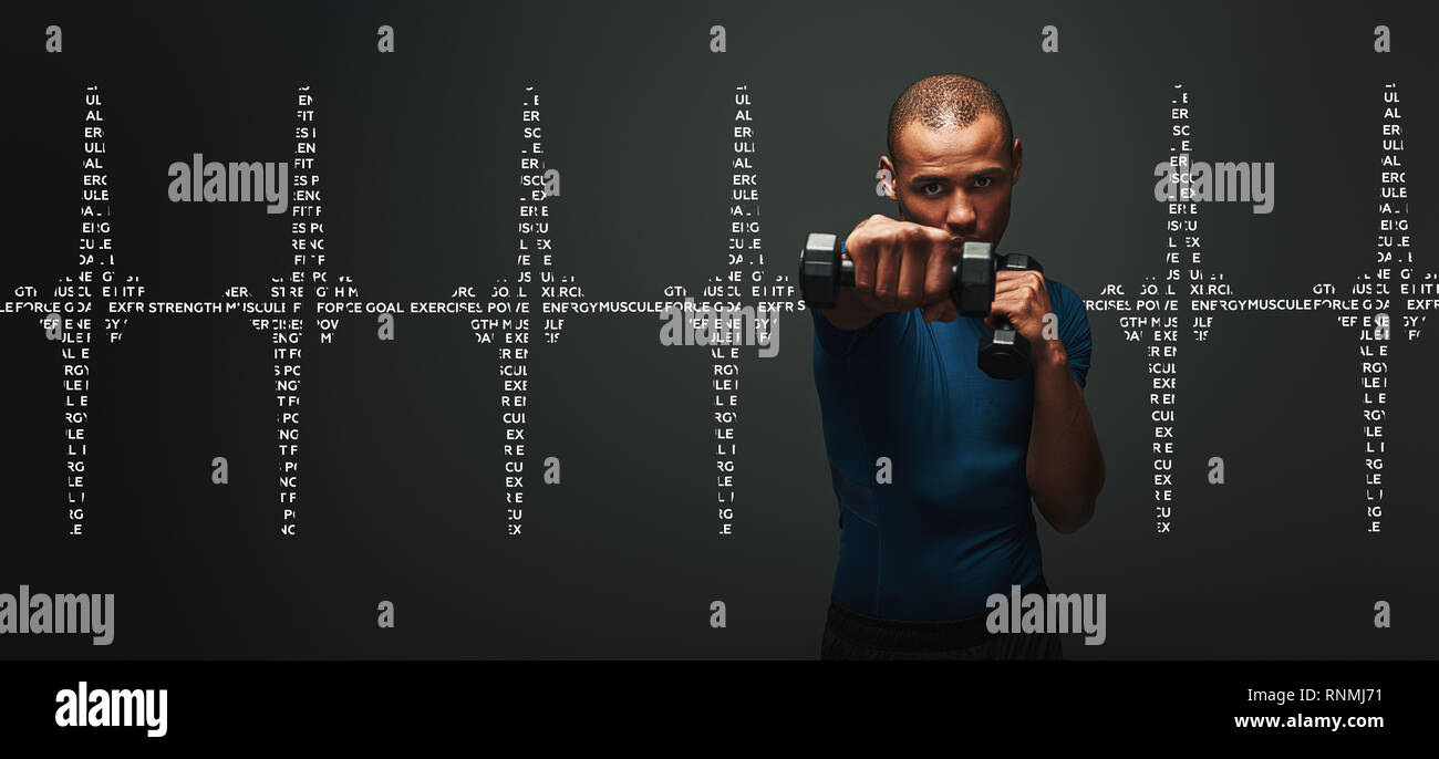 Muscular man flexing camera hi-res stock photography and images - Alamy