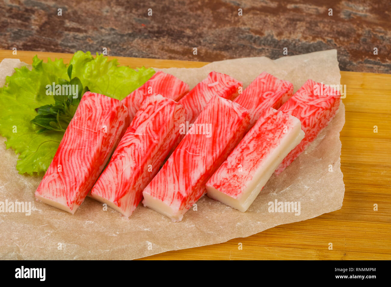 Crab surimi stick served salad leaves Stock Photo - Alamy