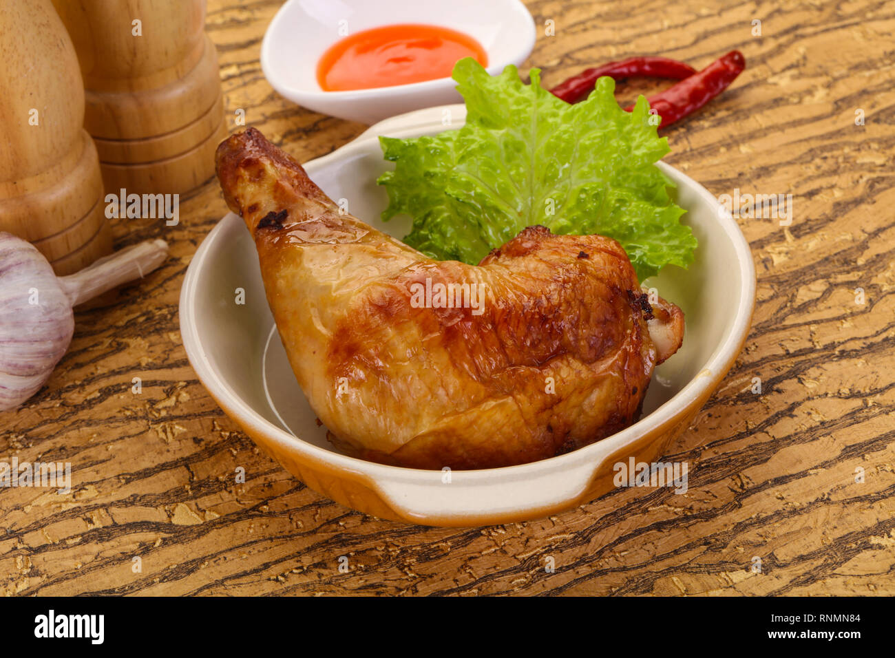 Crispy tasty Roasted chicken leg Stock Photo - Alamy