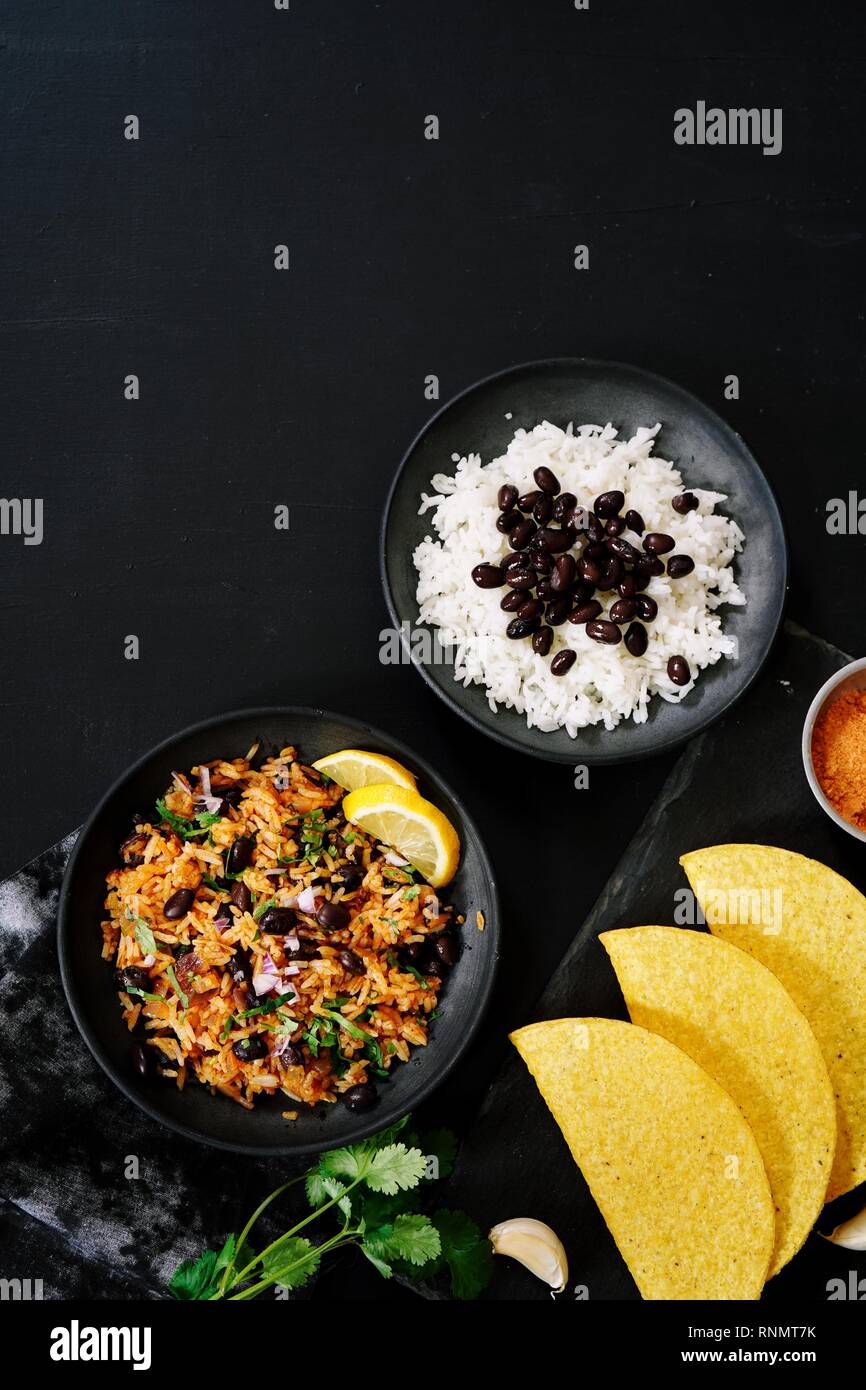 Rice and beans Taco shells on side / Mexican meal overhead view Stock ...
