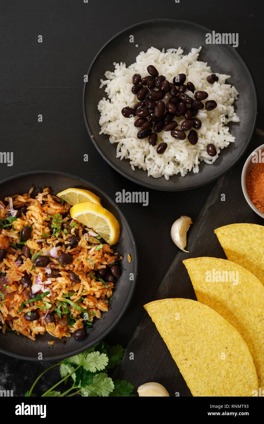 Rice and beans Taco shells on side / Mexican meal overhead view Stock ...