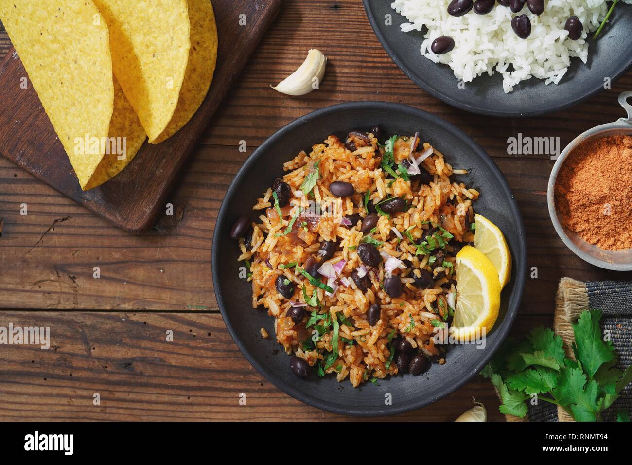 Rice and beans Taco shells on side / Mexican meal overhead view Stock ...