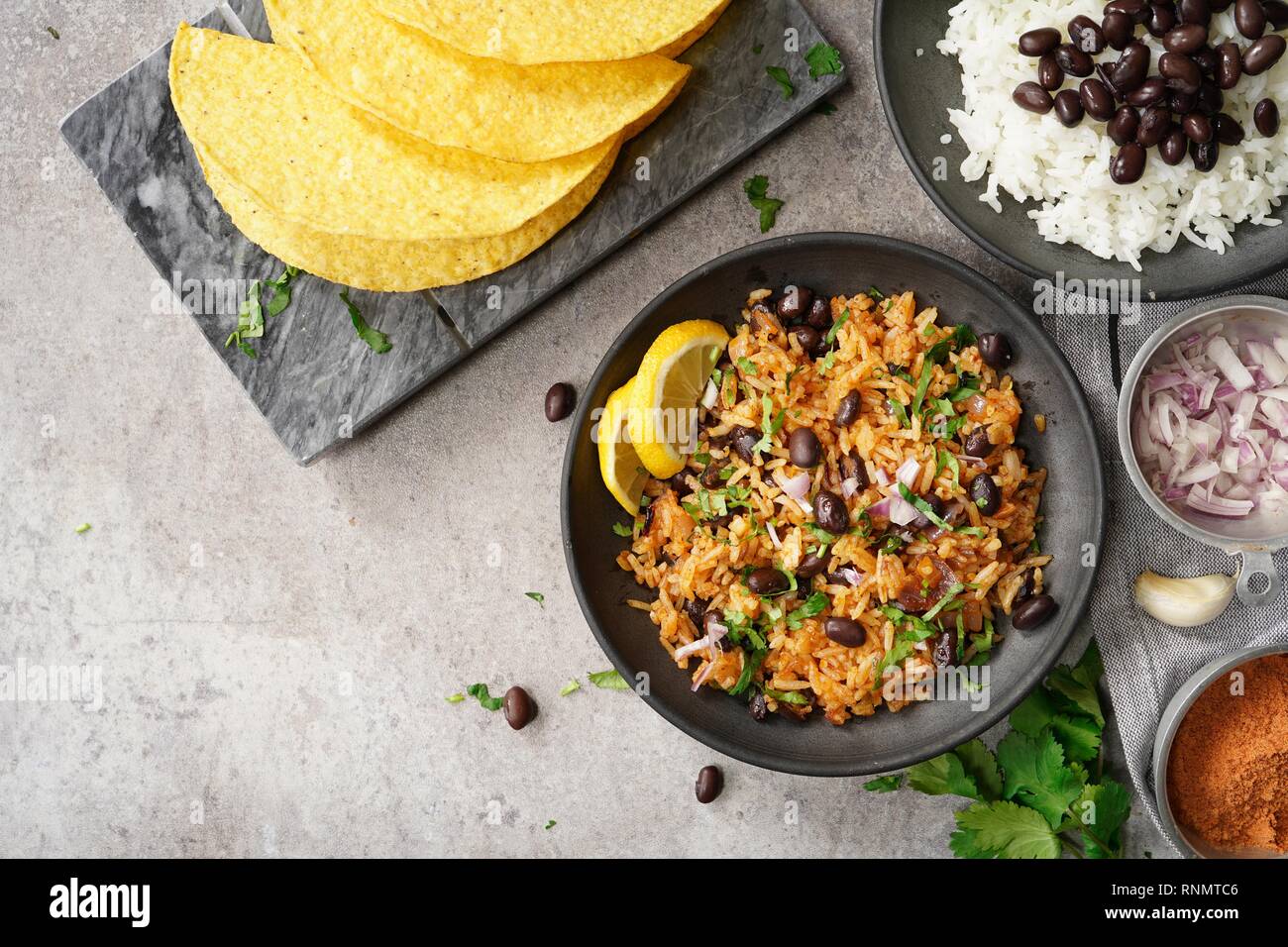 Rice and beans Taco shells on side / Mexican meal overhead view Stock ...
