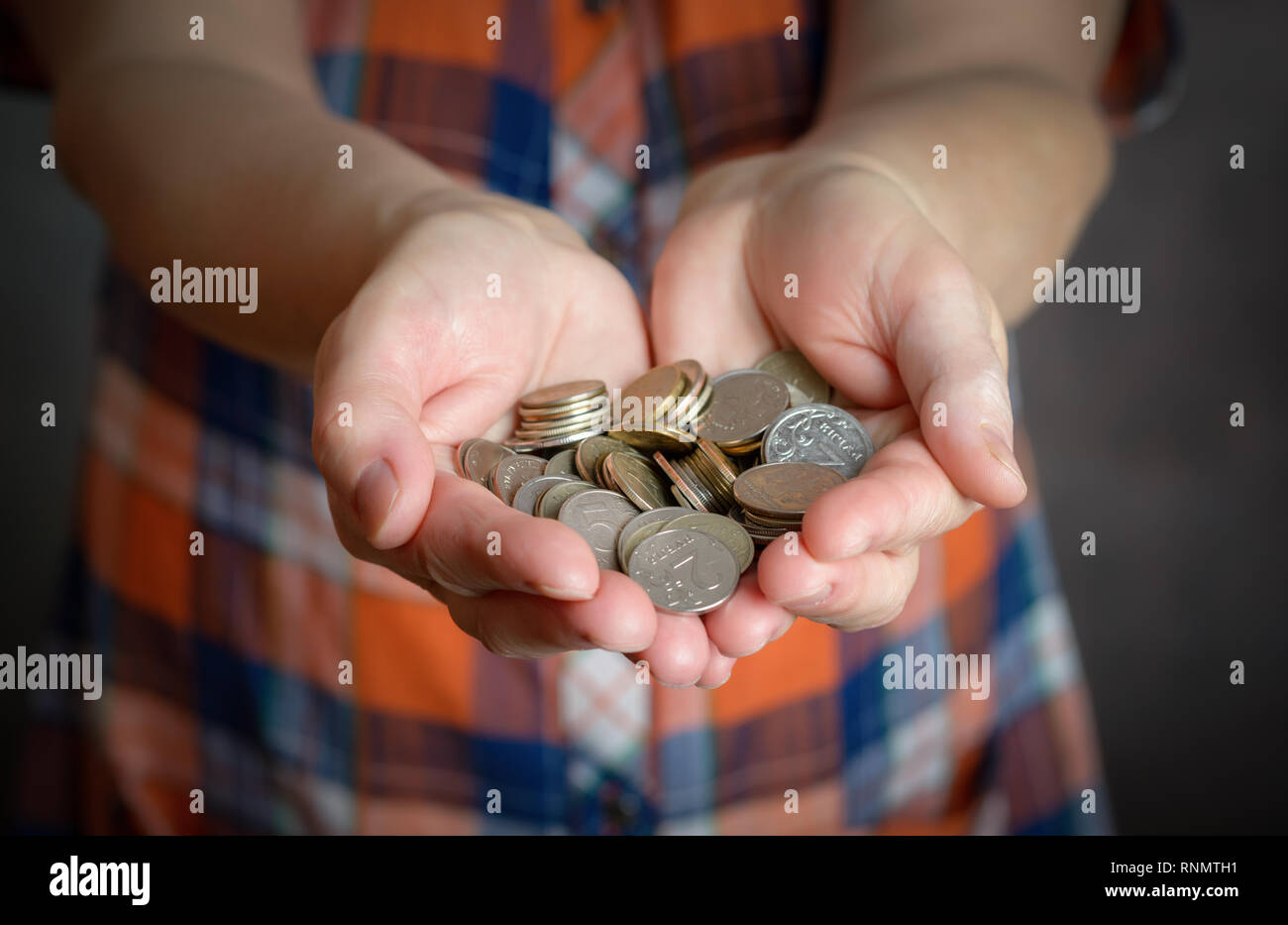 Russian coins in hands hi-res stock photography and images - Alamy