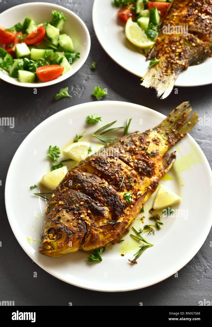 Cooked fish hi-res stock photography and images - Alamy