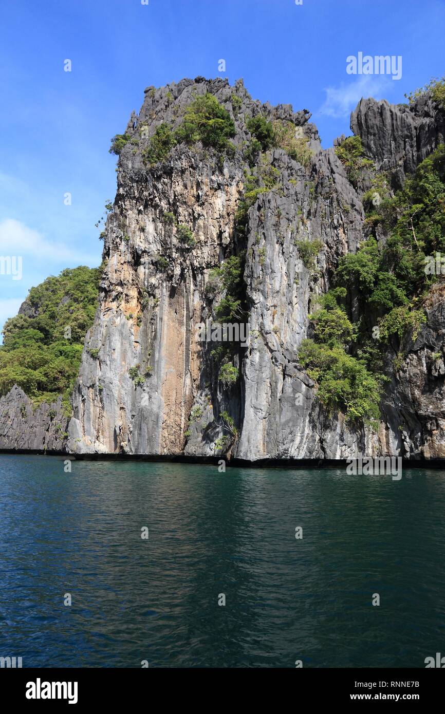 Karst rock cliffs - Palawan island hopping tour in Philippines Stock ...