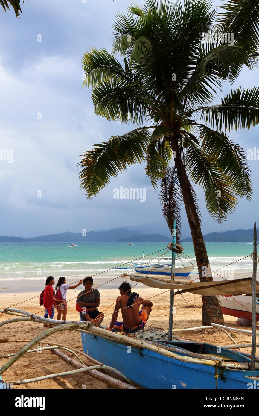 PALAWAN, PHILIPPINES - NOVEMBER 29, 2017: People visit Sabang beach in ...