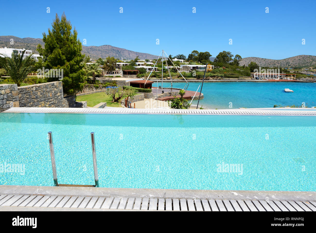 Swimming pool at luxury hotel, Crete, Greece Stock Photo - Alamy