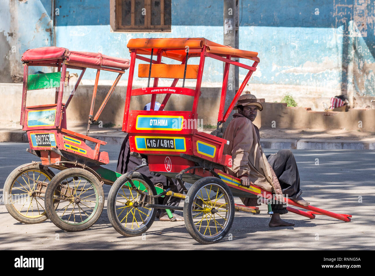 Rickshaw and driver Antsirabe, Madagascar Stock Photo - Alamy