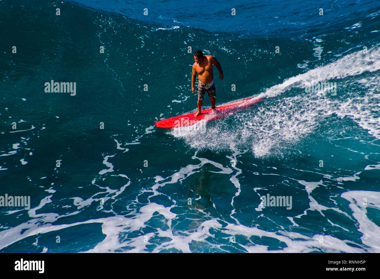 Riding big wave hi-res stock photography and images - Alamy