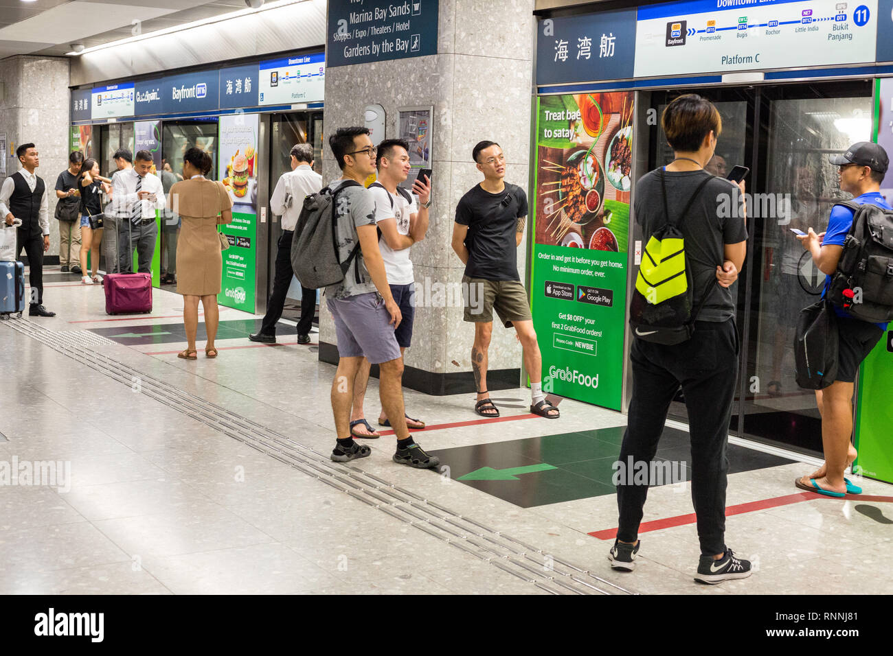 MRT Mass Rapid Transit Passengers Waiting to Board a Train, Singapore ...