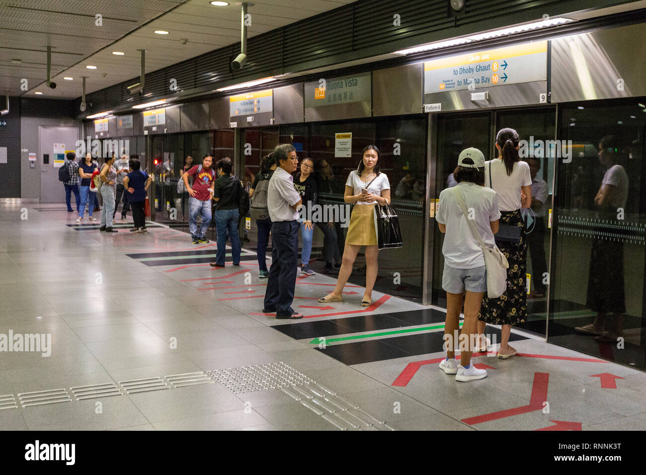 Singapore MRT Mass Rapid Transit Passengers waiting for the Next Train ...