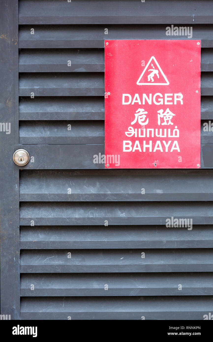 Danger Sign in Four Languages, English, Chinese, Malaysian, Tamil ...