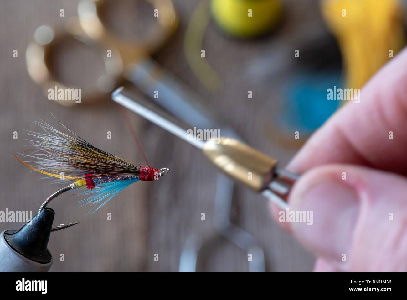 Tying a classic and colorful salmon wet fly Stock Photo - Alamy