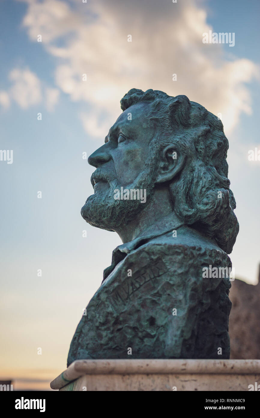 Statue of Yannis Ritsos outside his house in Monemvasia castle town. He ...