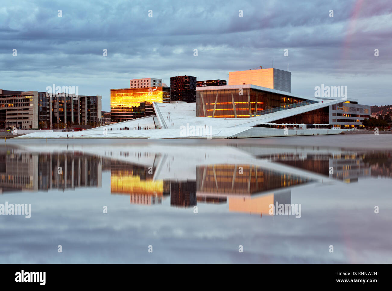 OSLO, NORWAY - JUNY 1: National Oslo Opera House shines at sunrise on ...