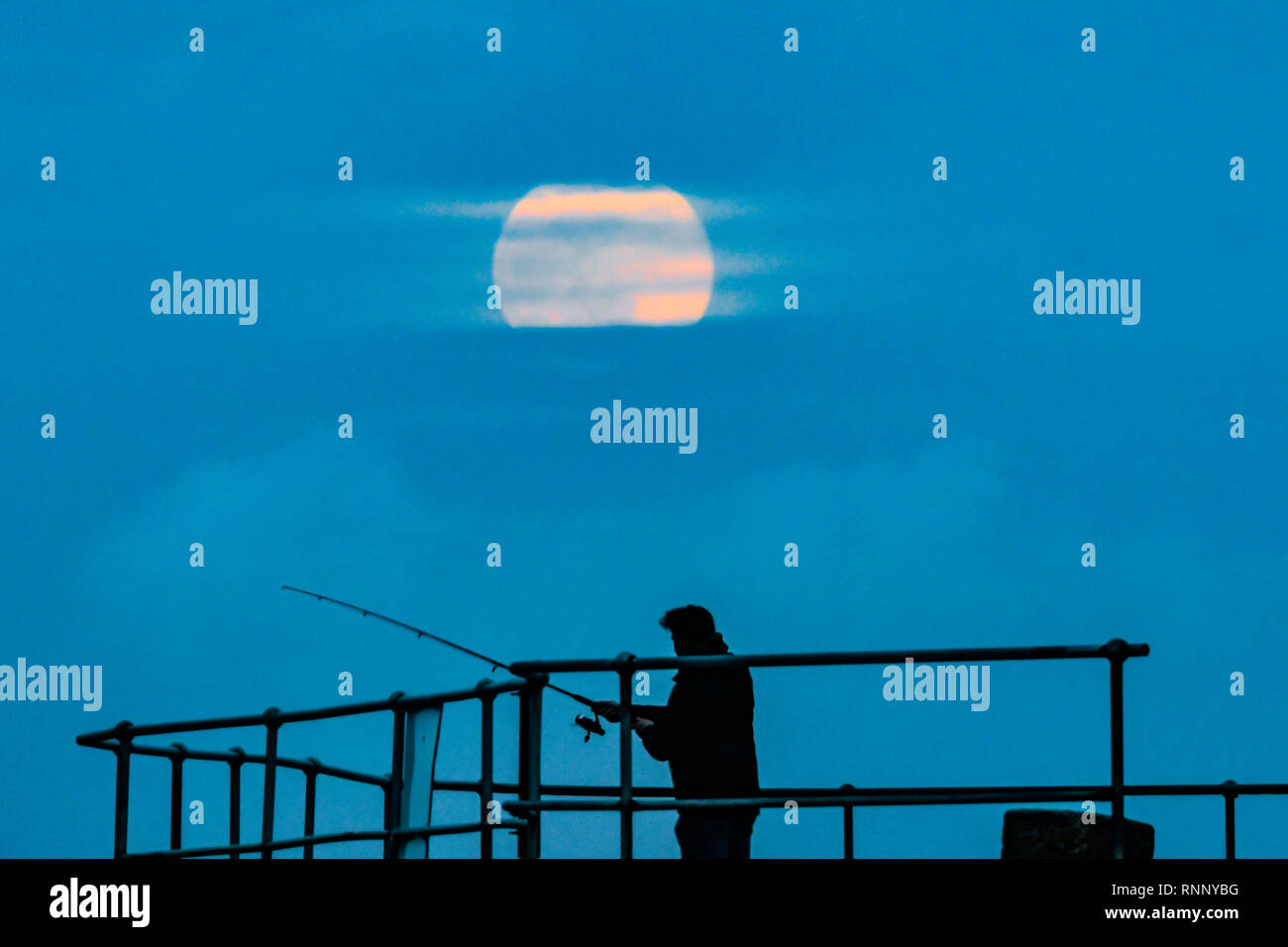Moon with man fishing hi-res stock photography and images - Alamy