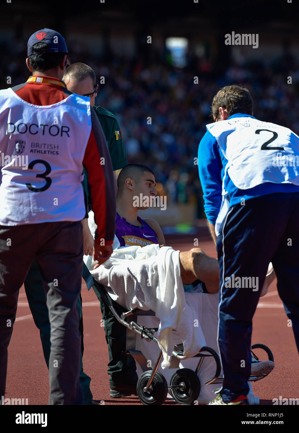 GB's Adam Gemili is helped from the track after pulling his hamstring ...