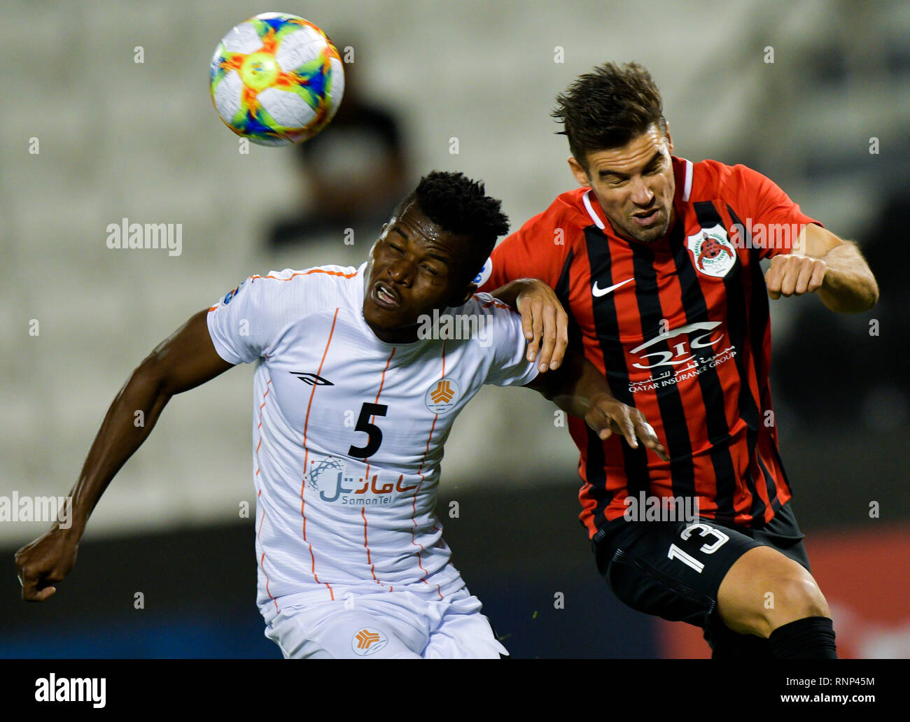 Doha, Qatar. 19th Feb, 2019. Gonzalo Viera (R) of Al Rayyan SC vies ...
