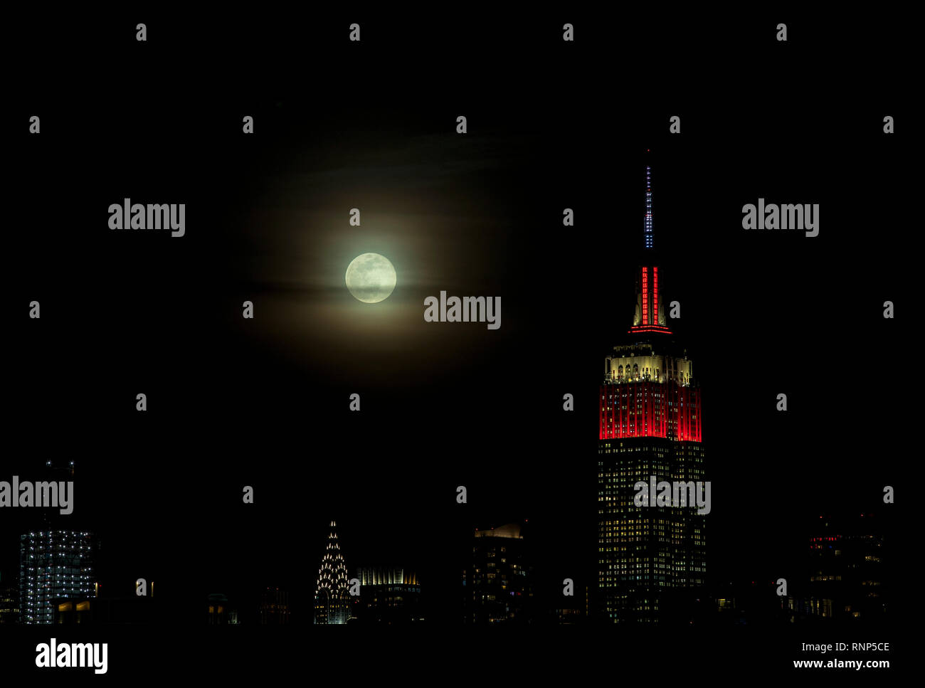 New York, USA. 19th Feb, 2019. A full moon is seen in the sky of ...