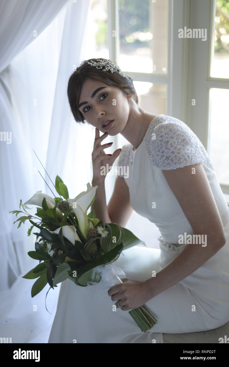 Pensive bride and groom hi-res stock photography and images - Alamy