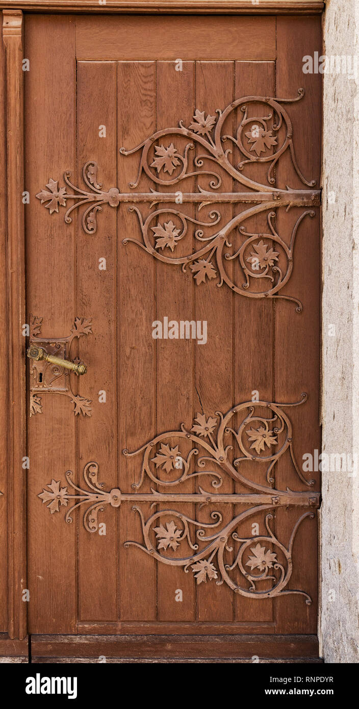 Antique inlaid wooden door with carved structure Stock Photo - Alamy