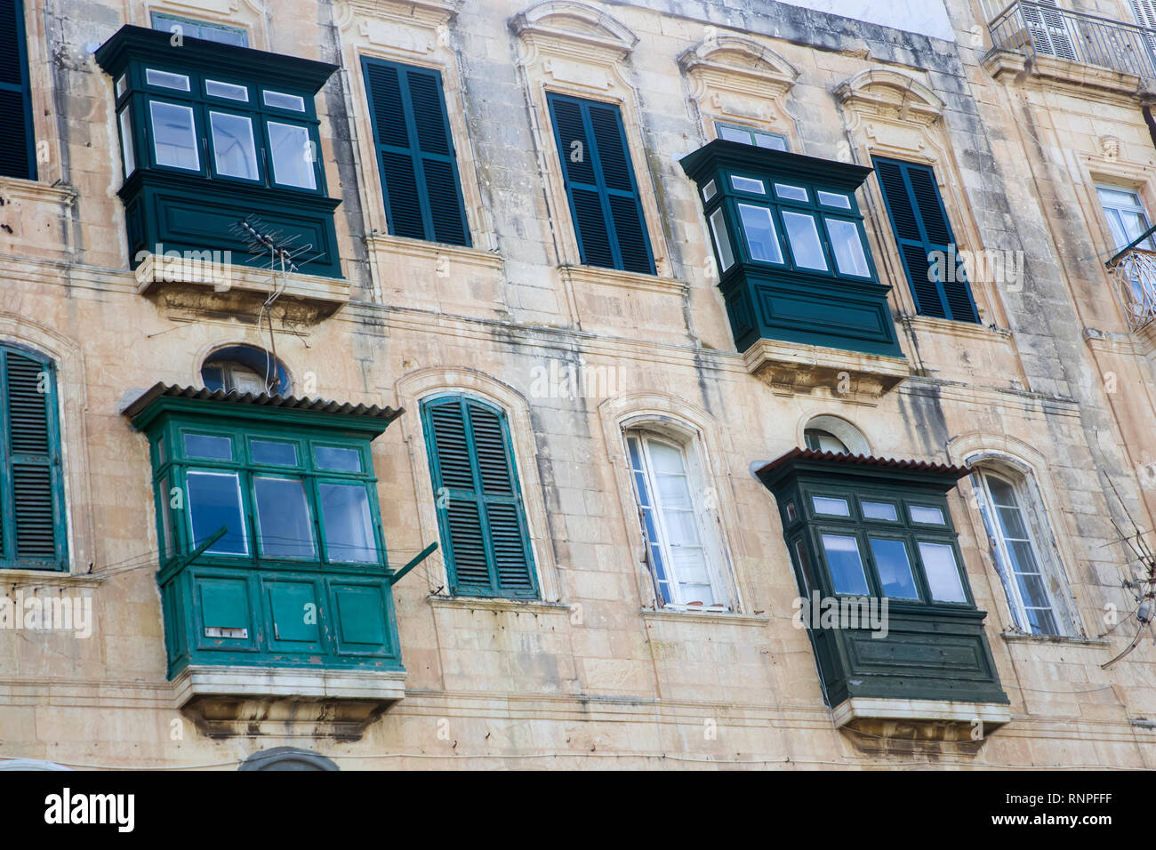 Old beautiful houses in the centre of the capital city Valetta in Malta ...