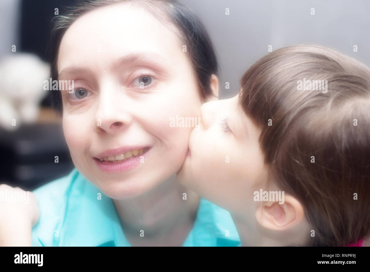 The Daughter Loves The Mother Daughter Gently Kisses Her Mother On The