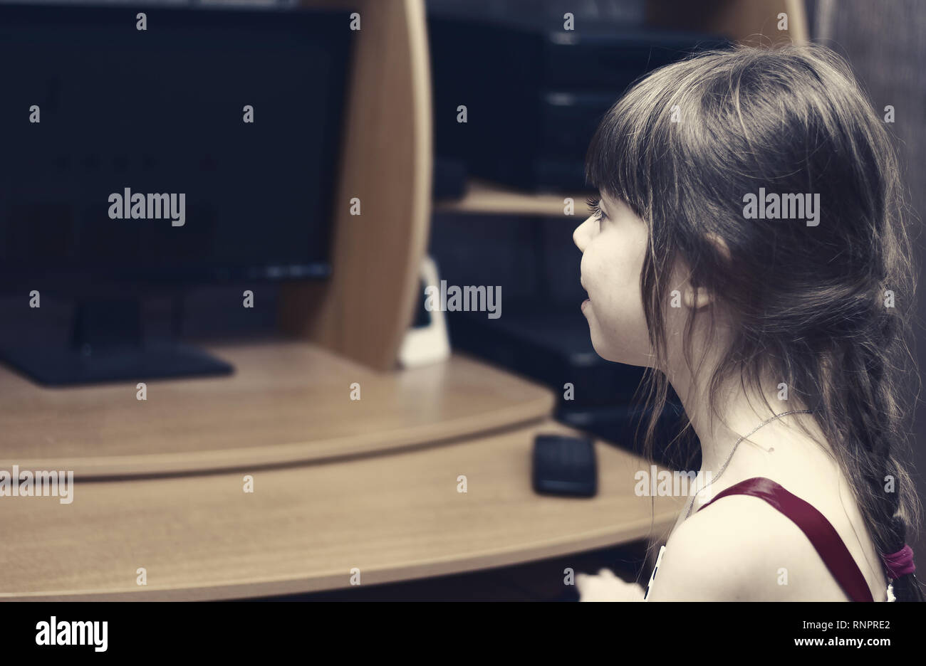 The girl spends her leisure time at the computer in the global social ...