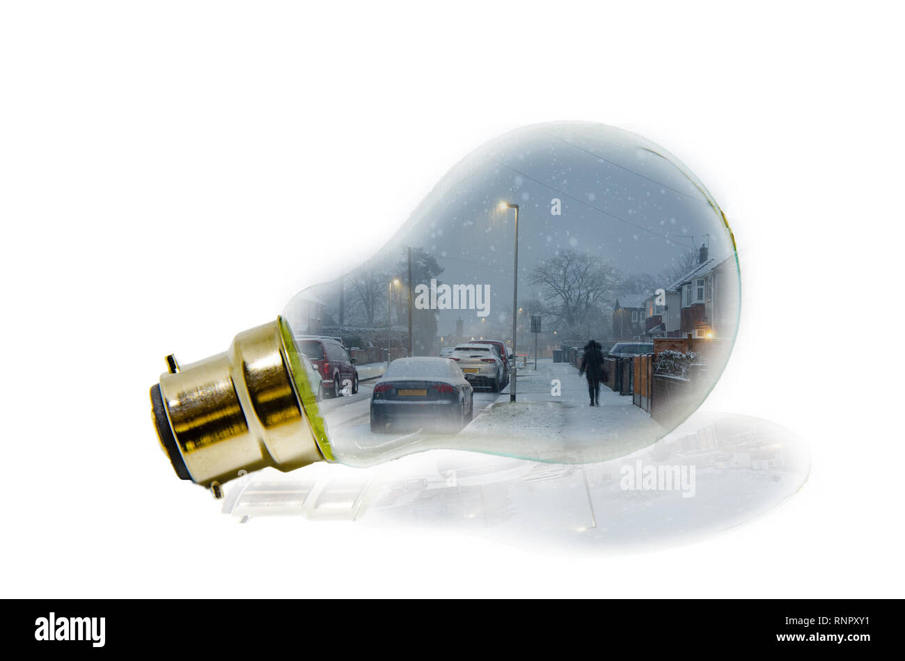 A composite of a winter street scene in a light bulb Stock Photo - Alamy