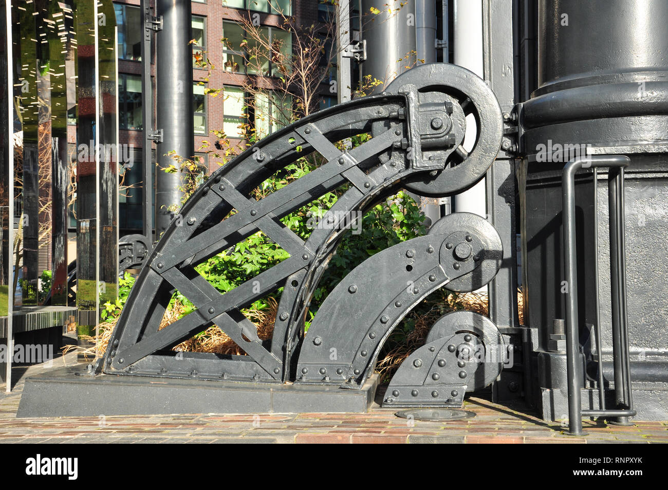 Guide wheels in old gasholder frames, King's Cross, London, England, UK ...