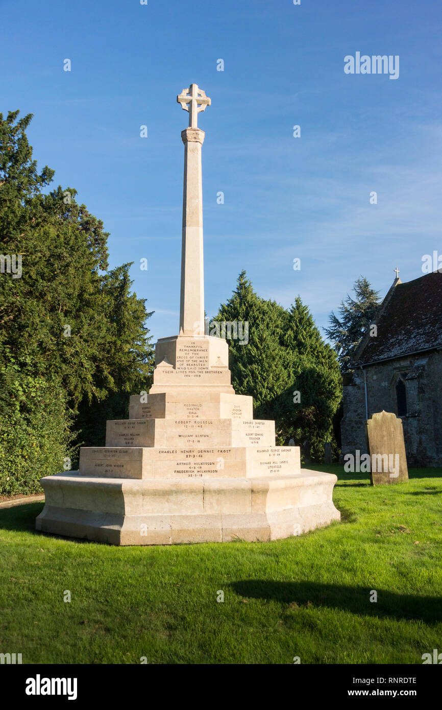 war Memorial and headstone in the grounds of Holy Cross Church, in the ...