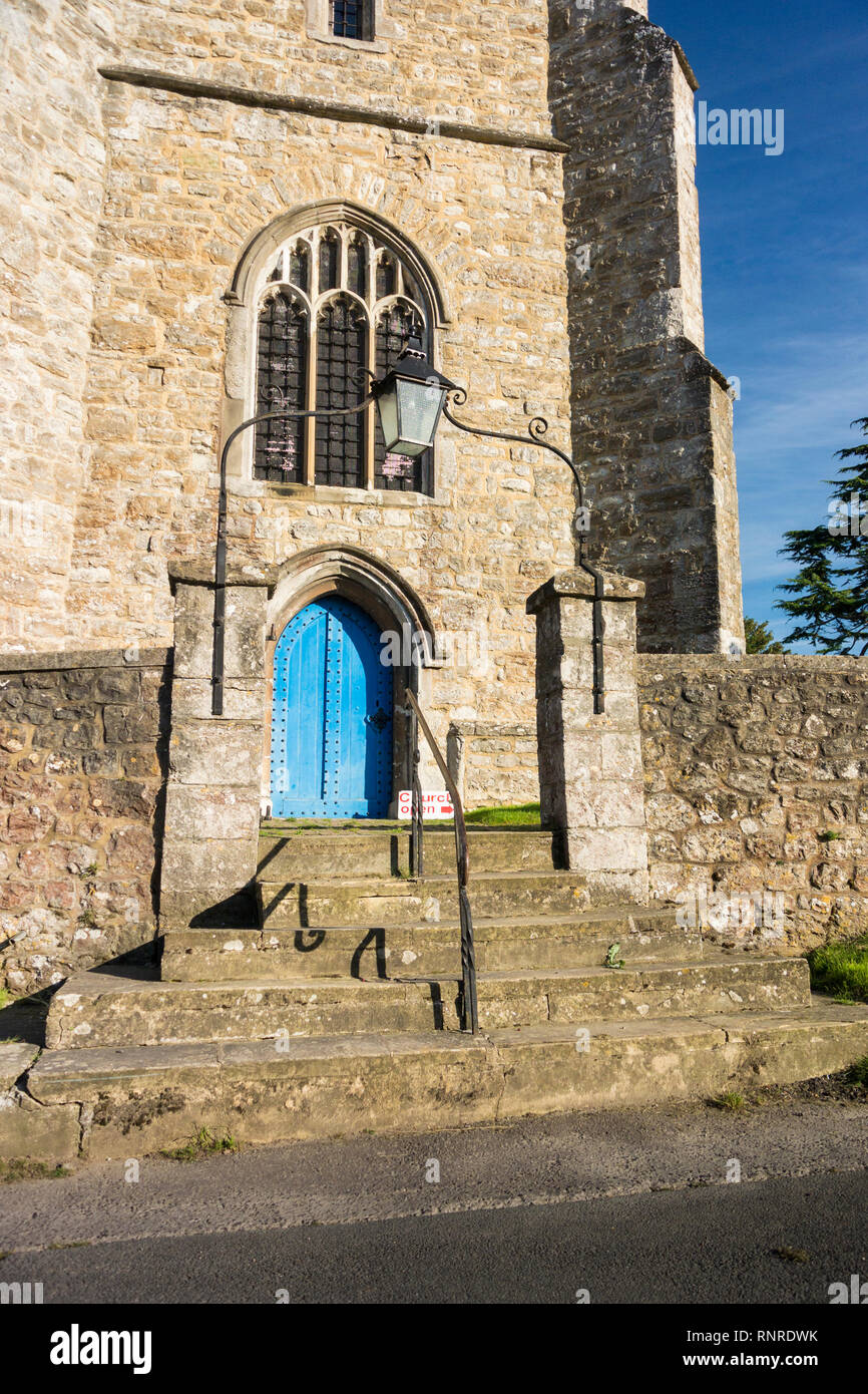 Steps and blue door of Holy Cross Church, Bearsted, Kent, UK Stock ...