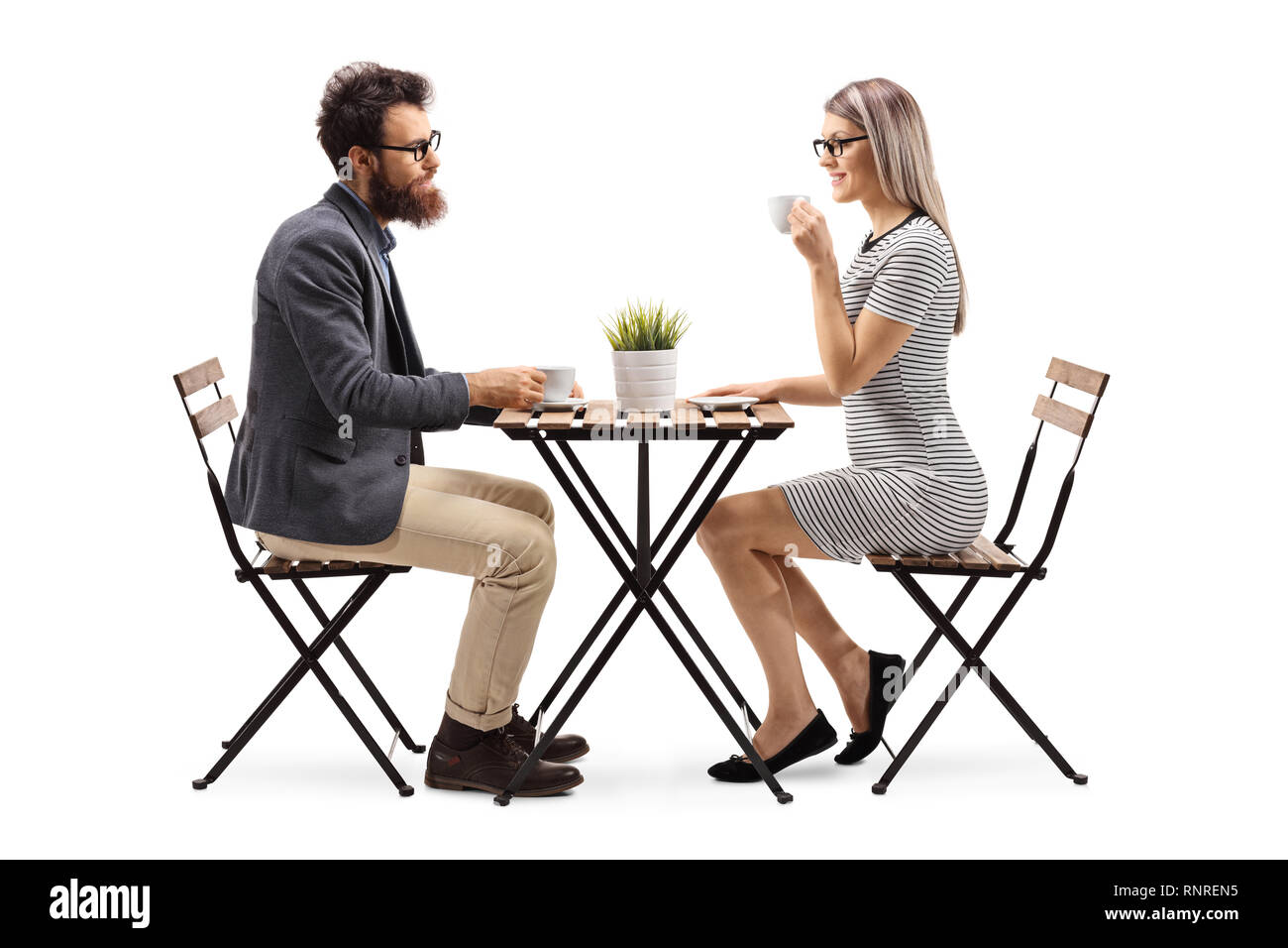 Man woman sitting table drinking coffee hi-res stock photography and ...
