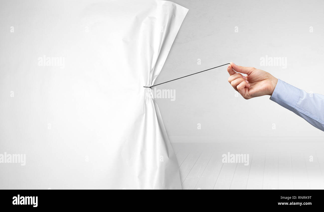 hand pulling white paper curtain, changing scene concept Stock Photo ...