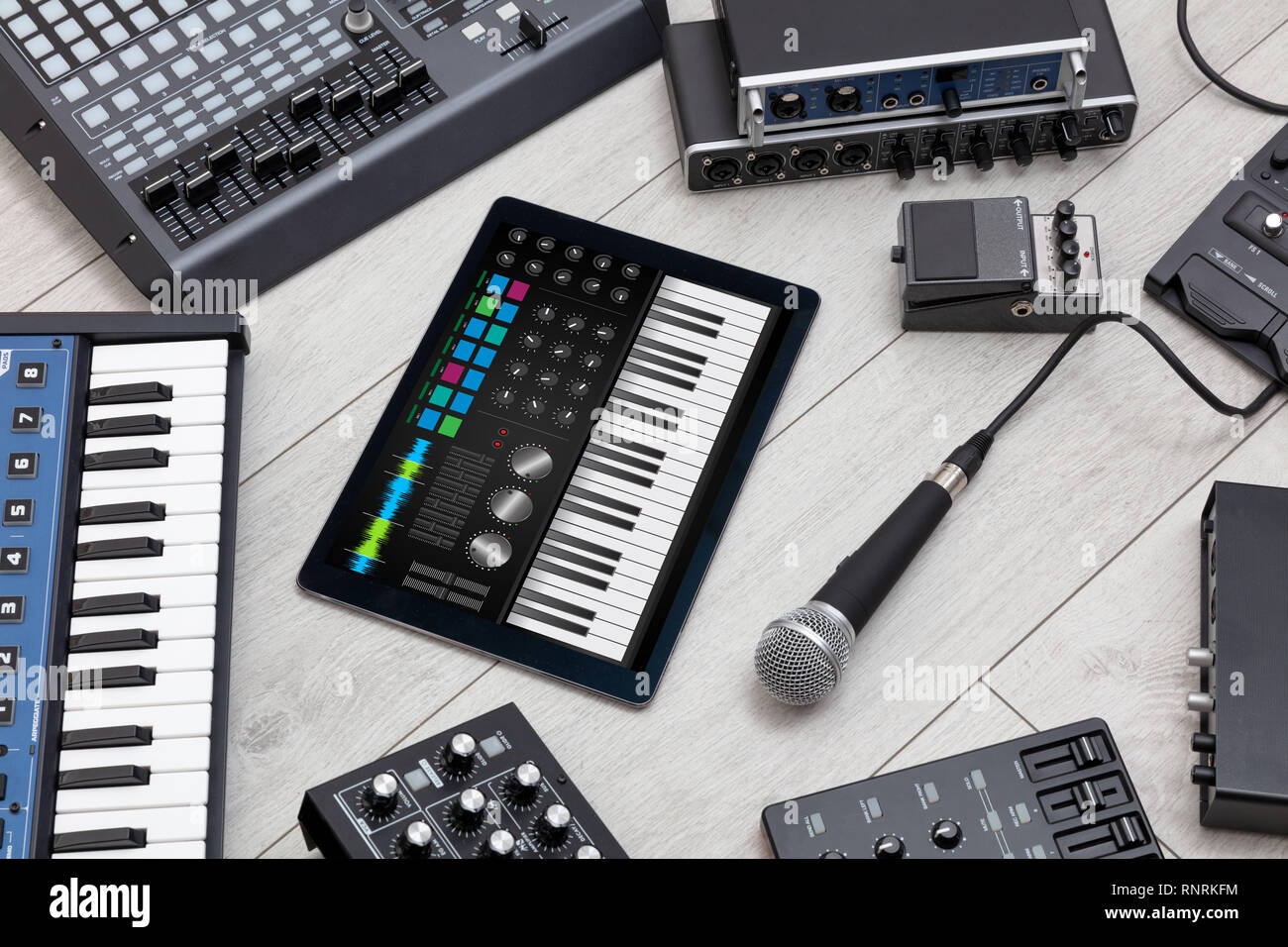 Piano synthesizer app on tablet and musical instrument concept Stock ...