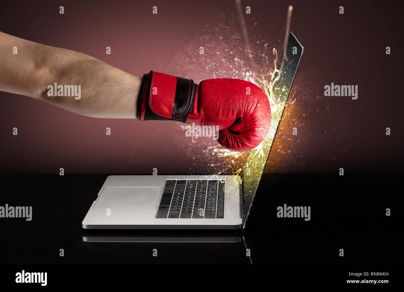 Strong arm boxing laptop screen strongly Stock Photo - Alamy
