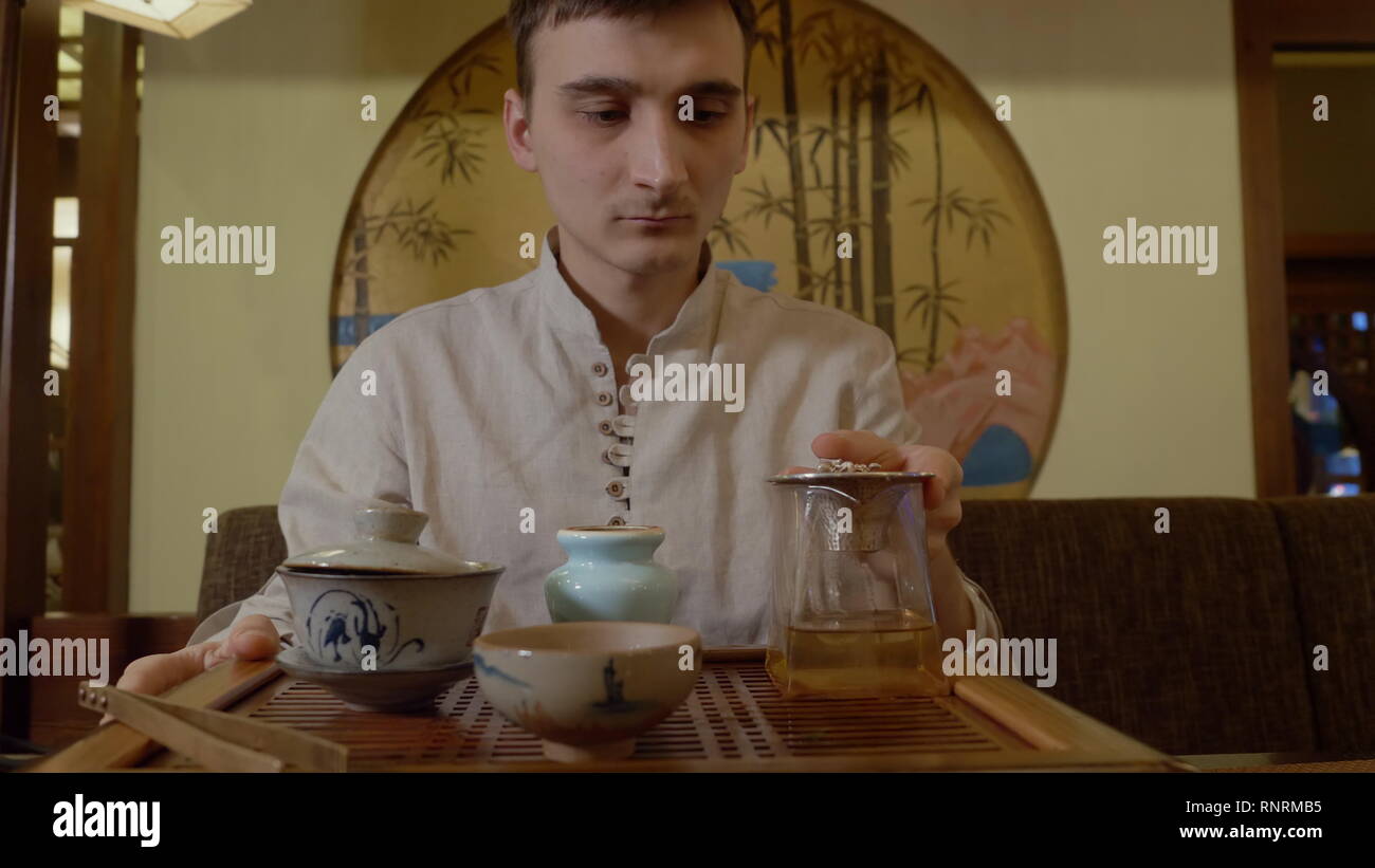 Master pouring green tea infusion hi-res stock photography and images ...