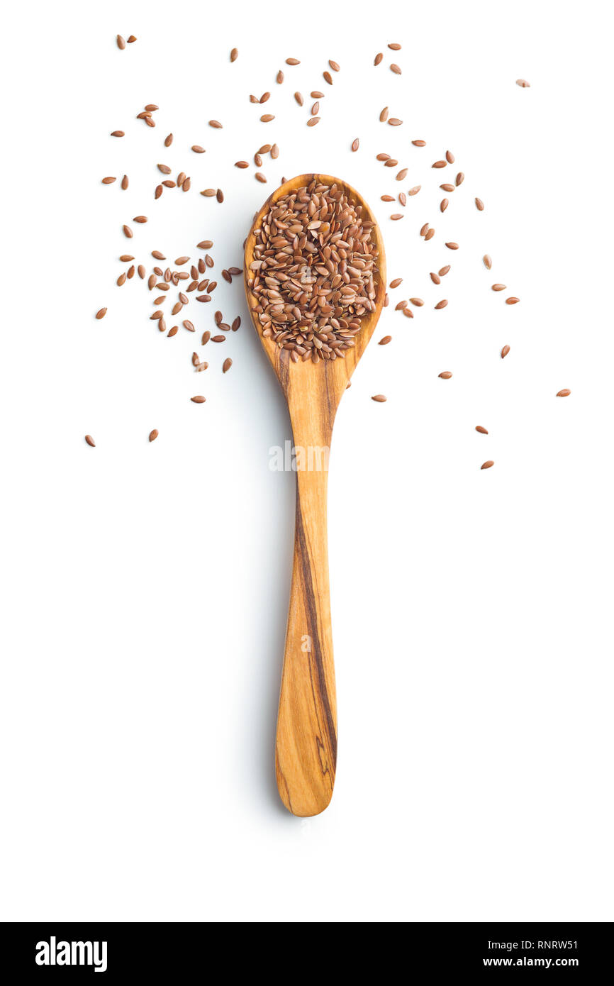 Flax seeds, linen seeds or linseeds in spoon isolated on white ...