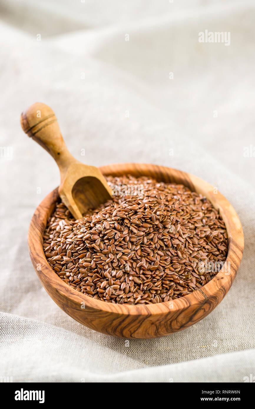 Flax seeds, linen seeds or linseeds in wooden bowl Stock Photo - Alamy