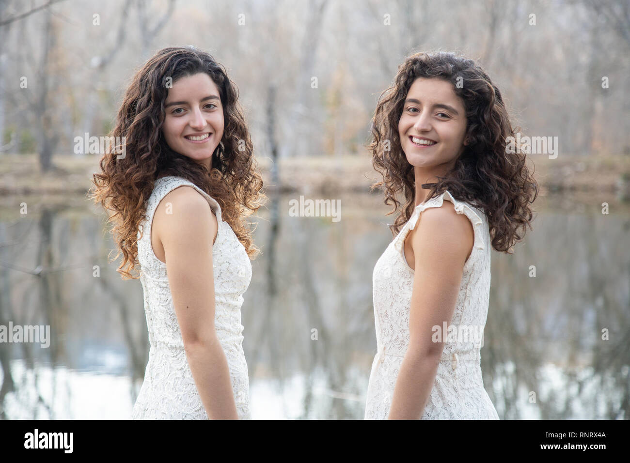 Two twin sisters standing on hi-res stock photography and images - Alamy