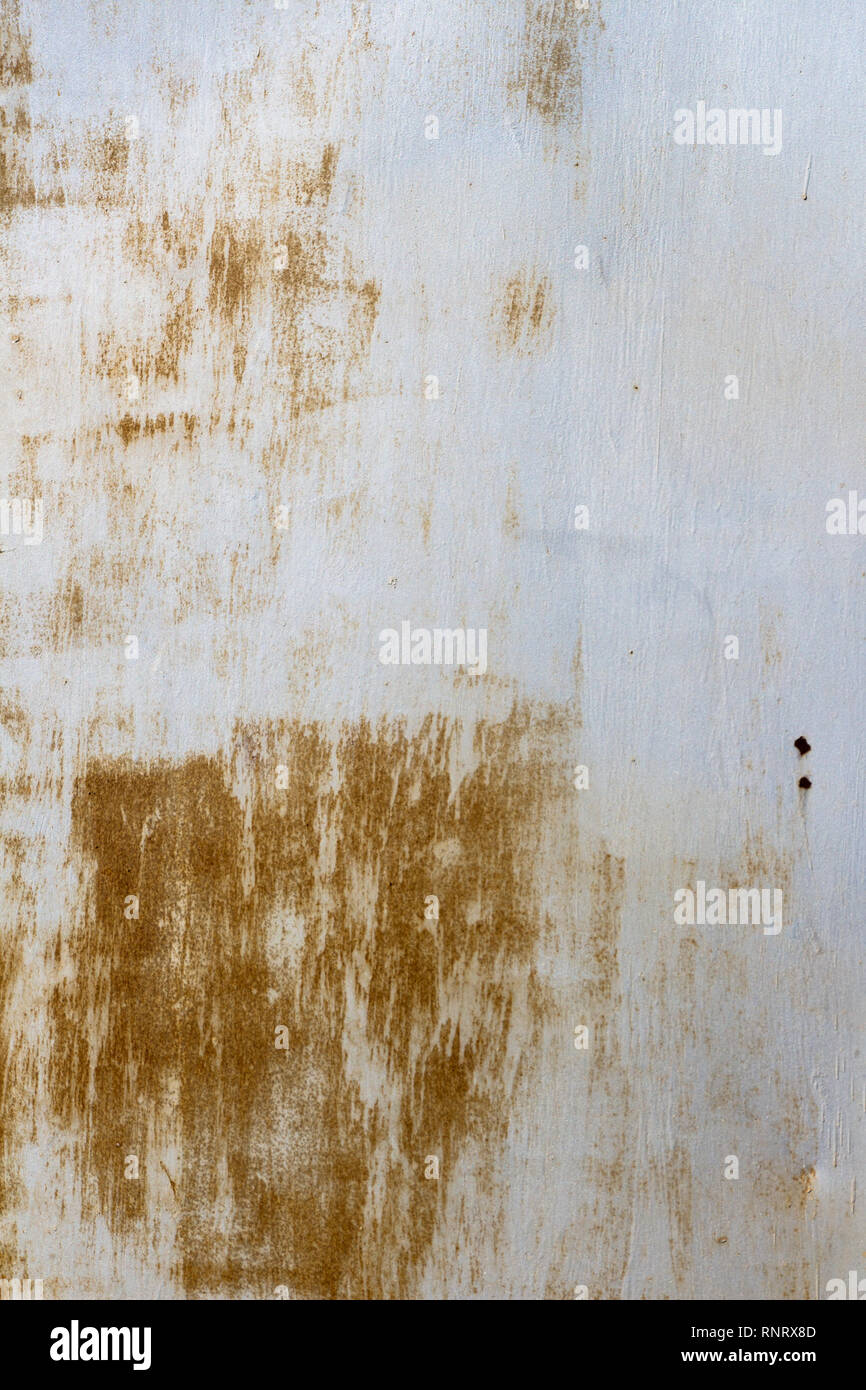rusty white metal background, white metal plate with traces of rust ...