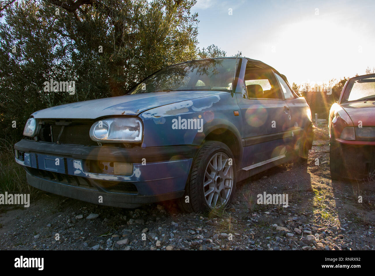 abandoned cars in the field, damaged cars, cars rusting in a prairie ...