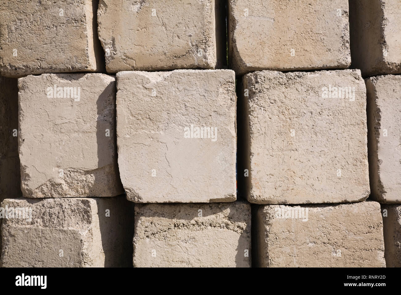 Close-up of large and heavy stacked square shaped concrete blocks Stock ...