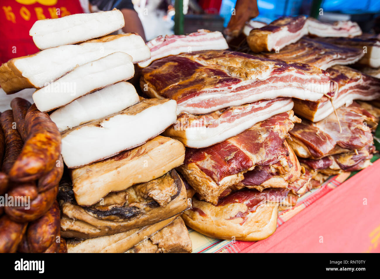 Smoked bacon selection. Domestic traditional food on outdoors local ...