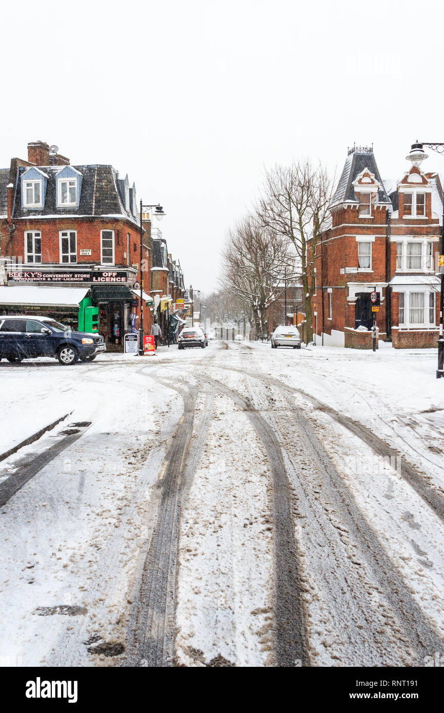 Snow brings difficult travel and driving conditions. North London, UK ...