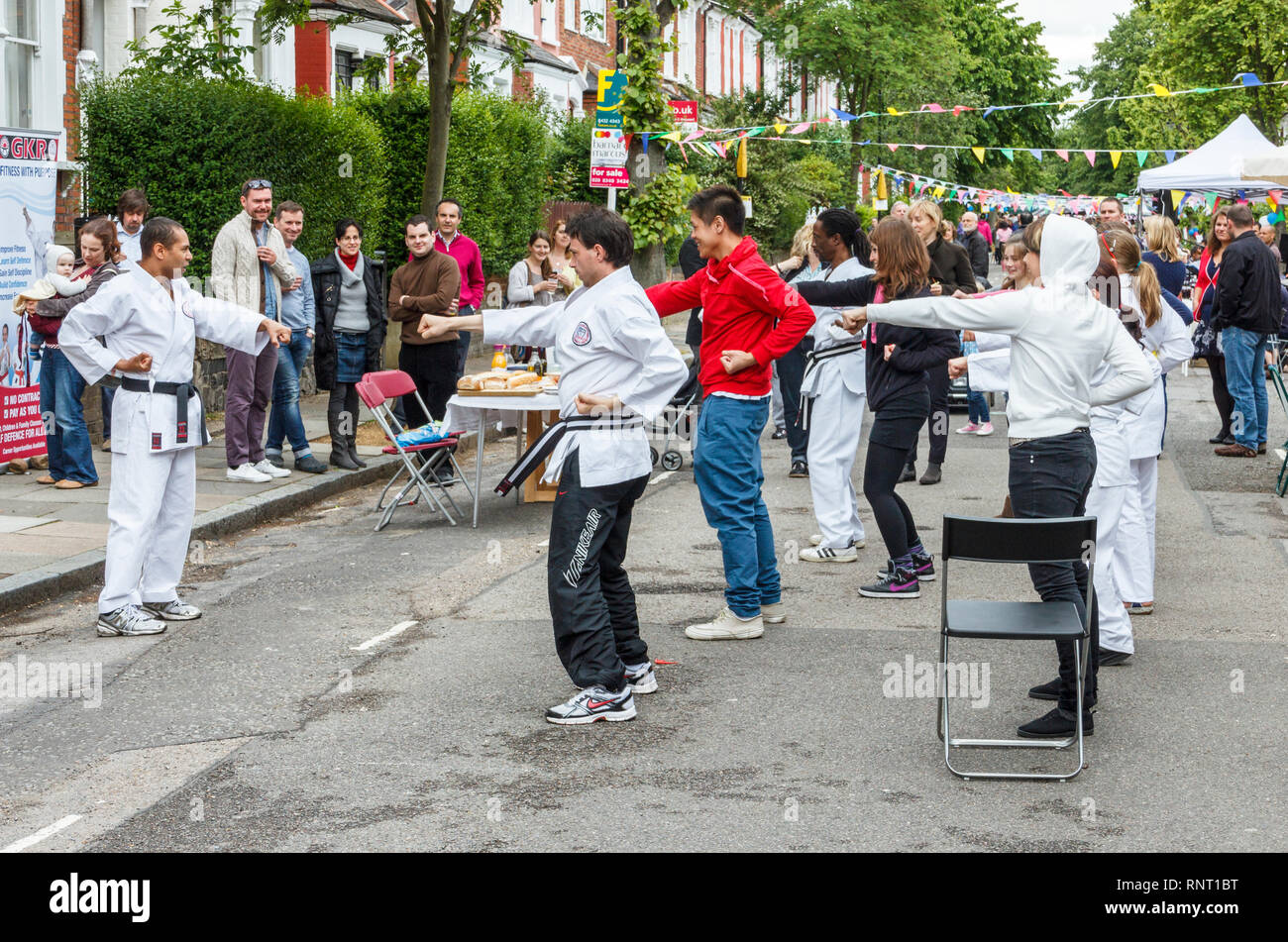 A karate demonstration at a jubilee street party in North London, UK ...